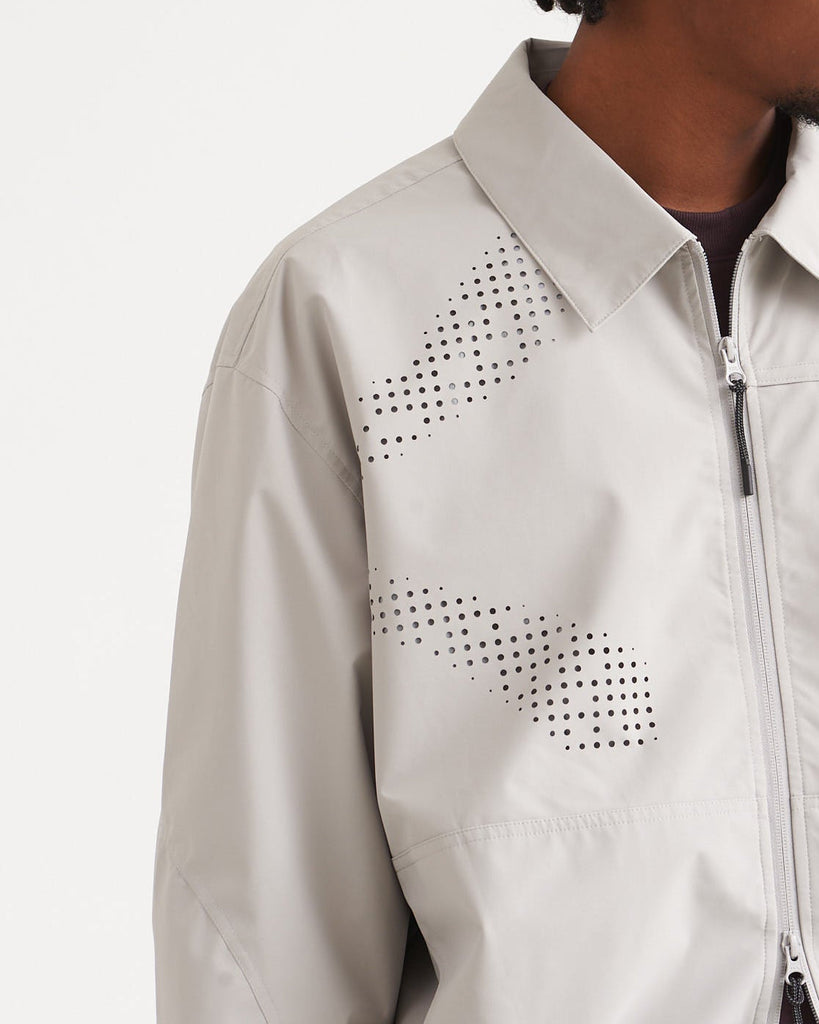 NINE POINT NINE SPIRAL LASER COACH JACKET-IVORY - Popcorn Store